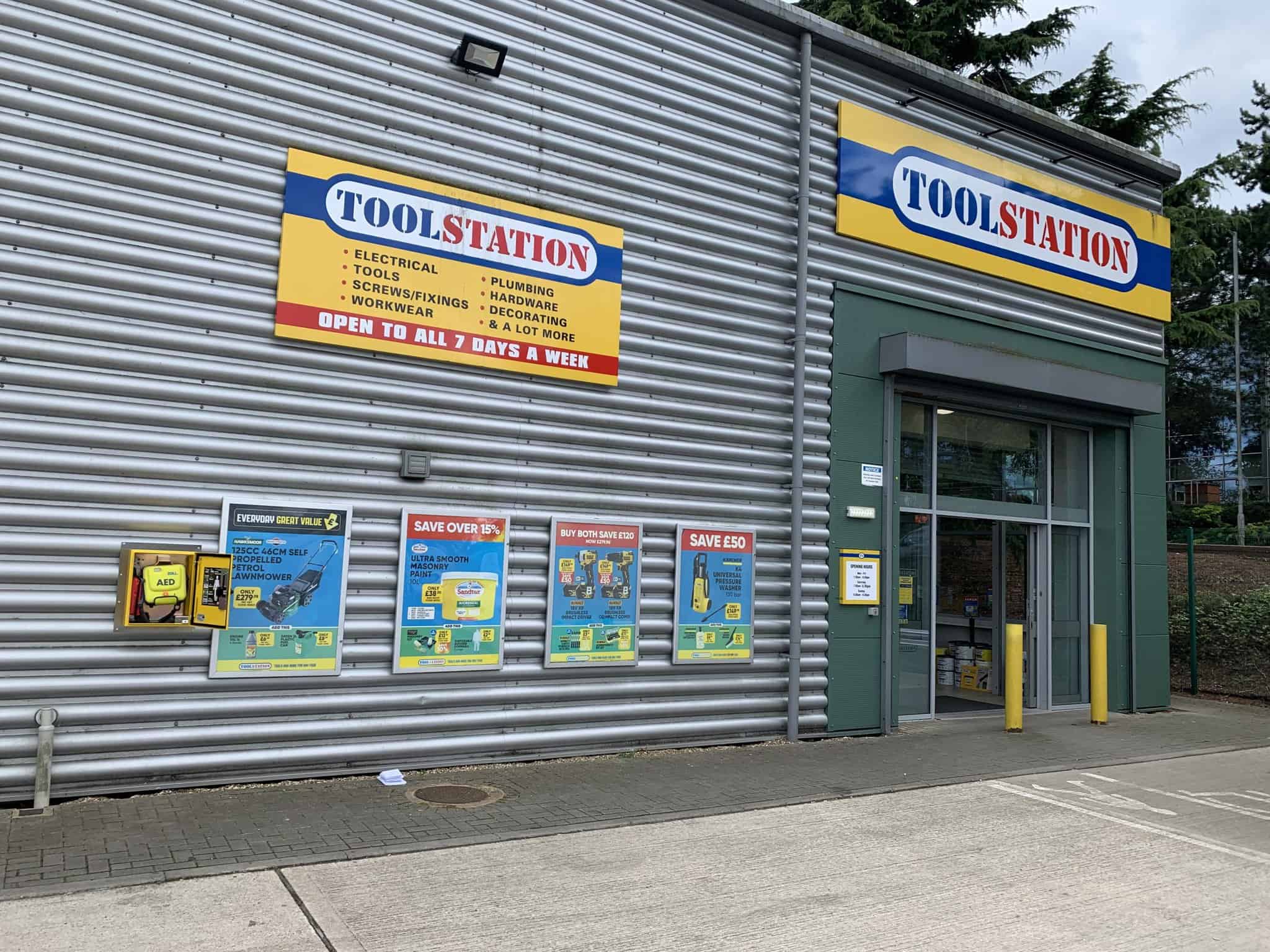 Bracknell BID install a new defibrillator at Toolstation - Bracknell BID